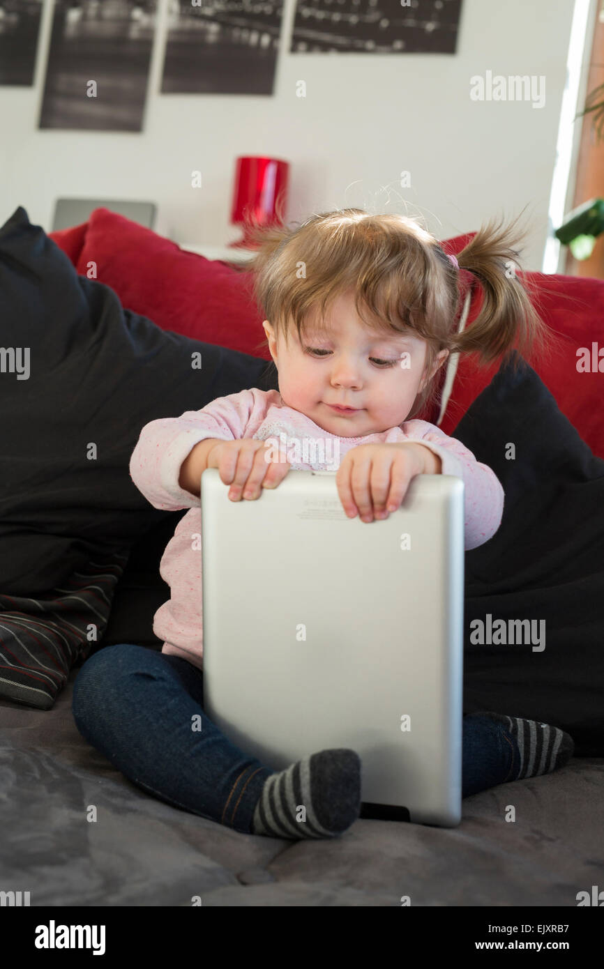 Little girl with tablet PC Stock Photo - Alamy
