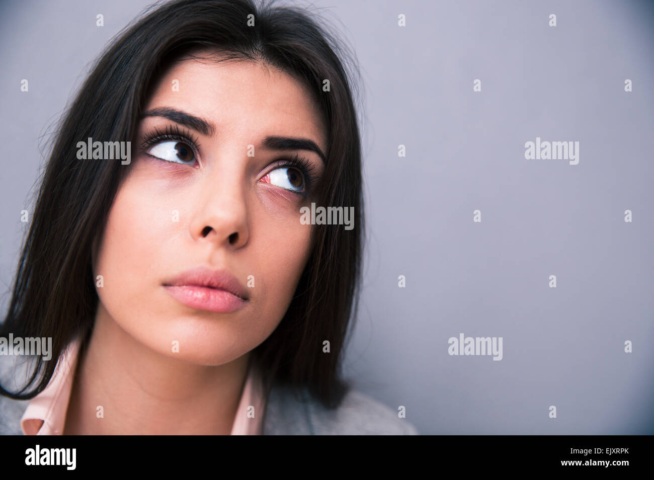 Closeup portrait of a beautiful woman looking up Stock Photo - Alamy