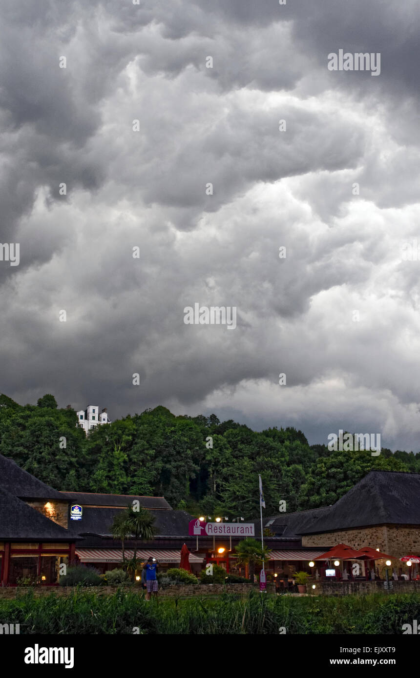 black boiling clouds over Dinan Brittany France as summer thunder storm ...
