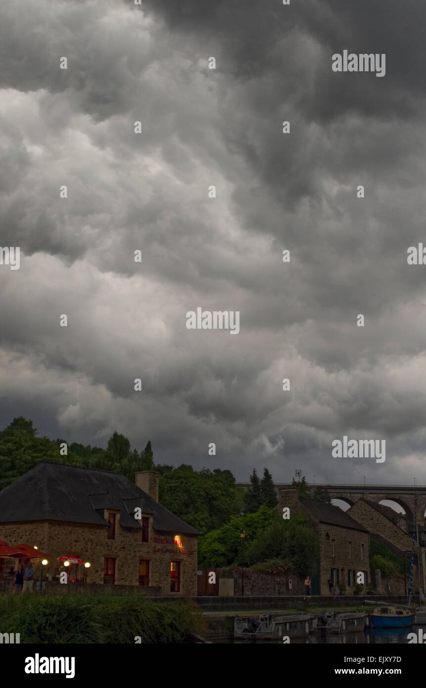 black boiling clouds over Dinan Brittany France as summer thunder storm ...