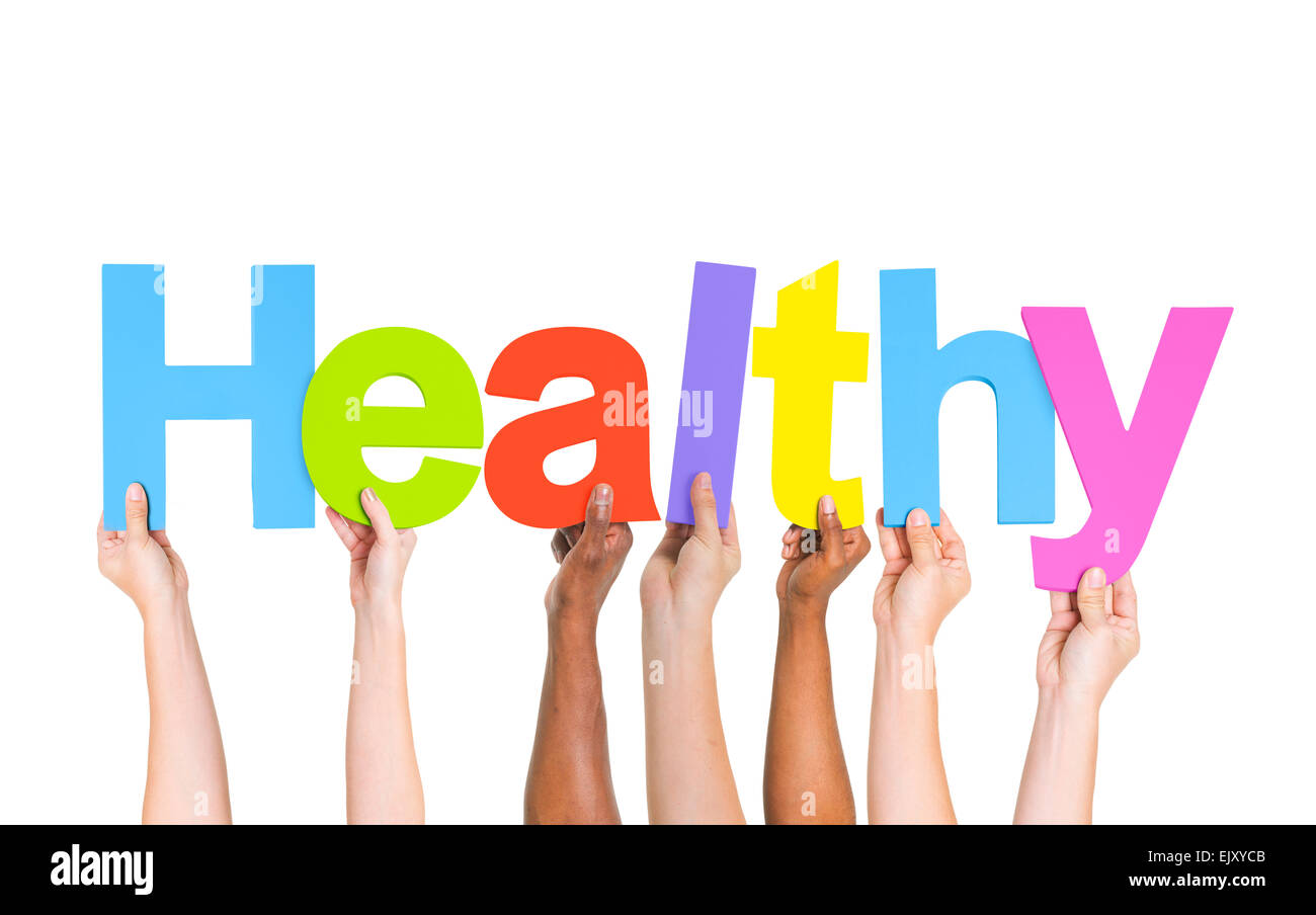 Diverse Hands Holding The Word Healthy Stock Photo - Alamy