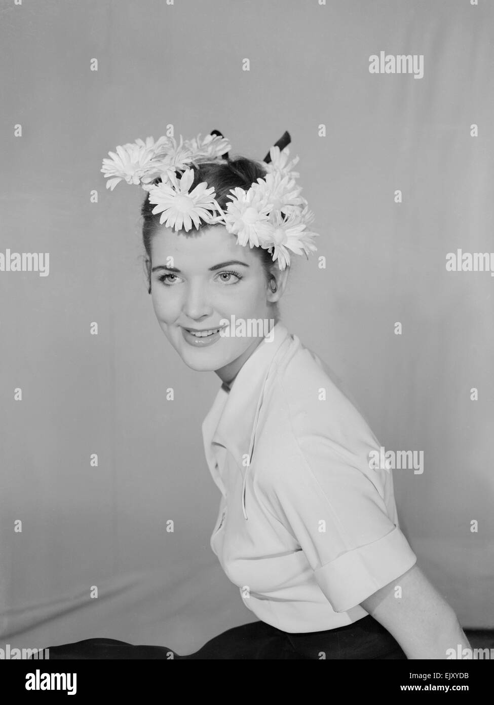 Reveille model seen here wearing a flower circle in her hair Stock ...