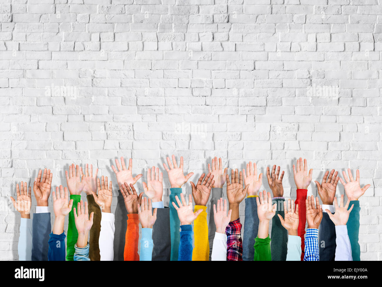 Group of Multiethnic Diverse Hands Raised Stock Photo - Alamy