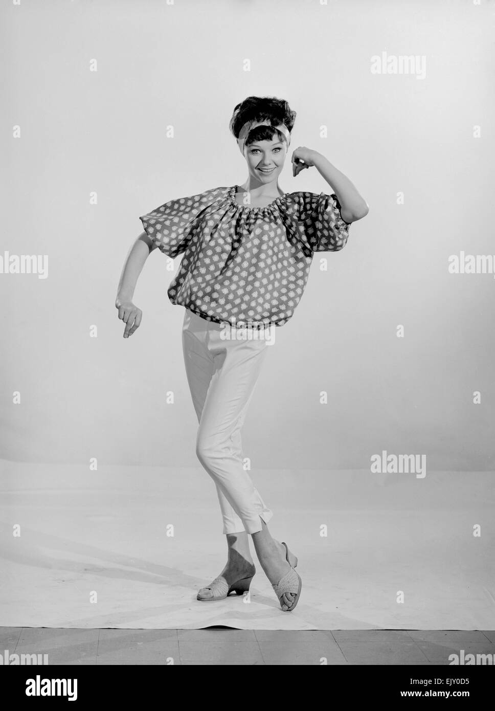 Reveille Model Meriel Weston modelling a spotted blouse May 1961 Stock ...