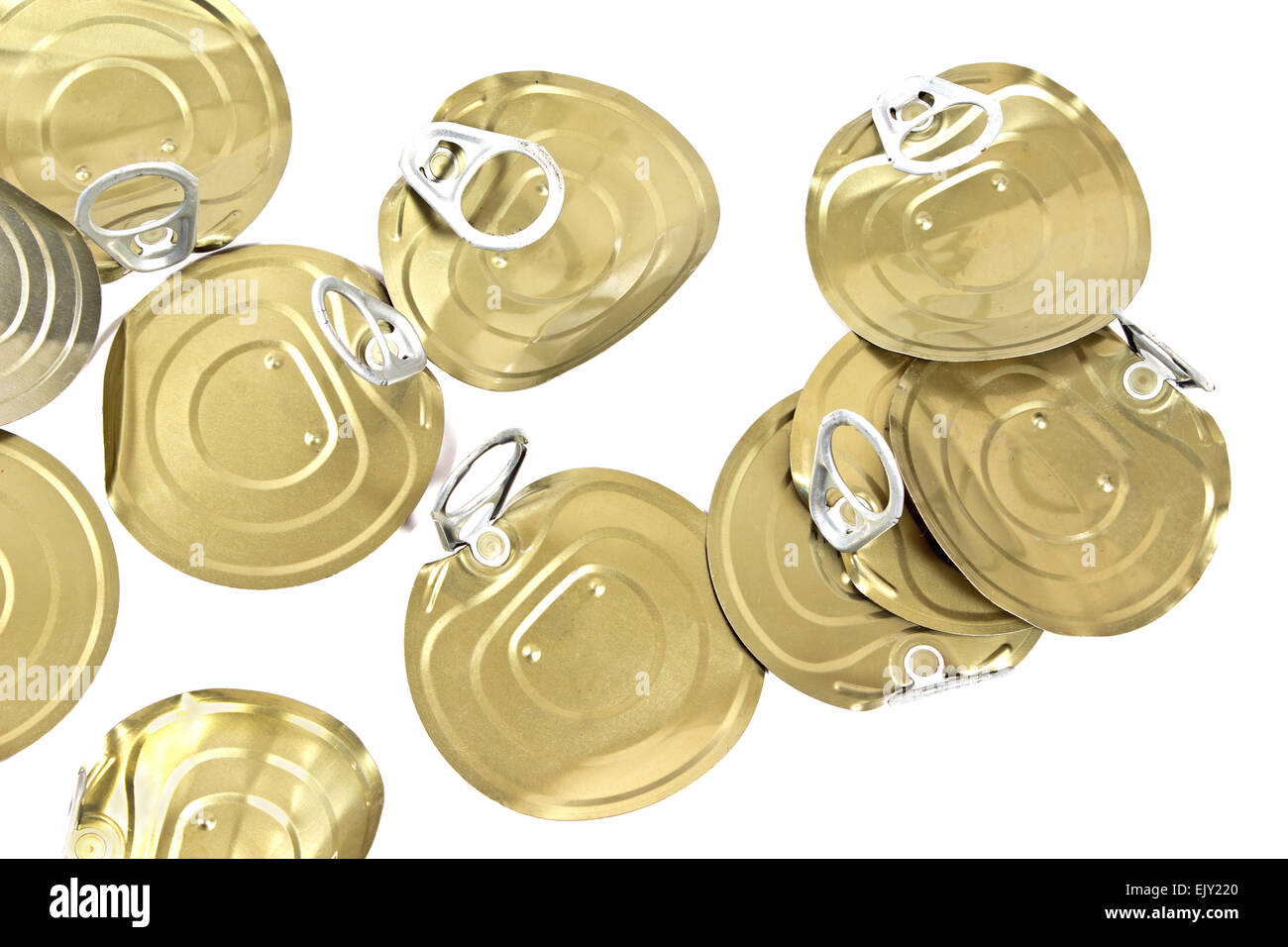 Tin can lids with opener on white Stock Photo - Alamy