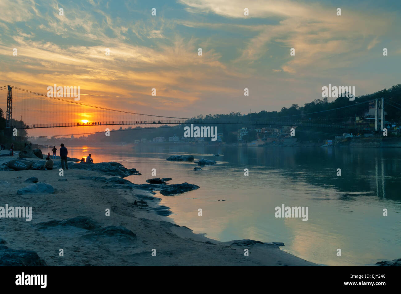 View of River Ganga and Ram Jhula bridge at sunset. Rishikesh. India ...