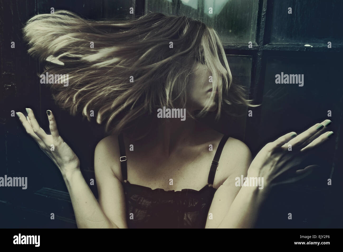 Hair blown in face by wind hi-res stock photography and images - Alamy