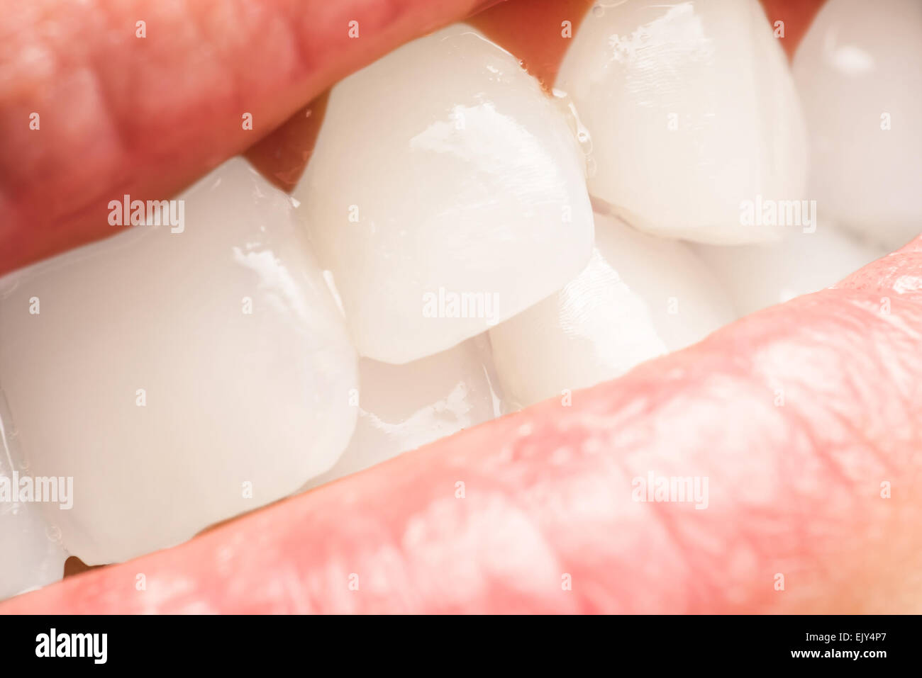 Woman Natural Lips And White Teeth Macro Stock Photo - Alamy