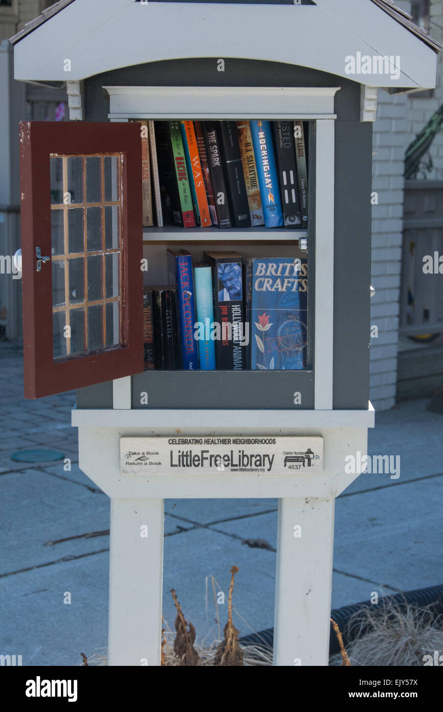 Small local free library to swap books Stock Photo - Alamy