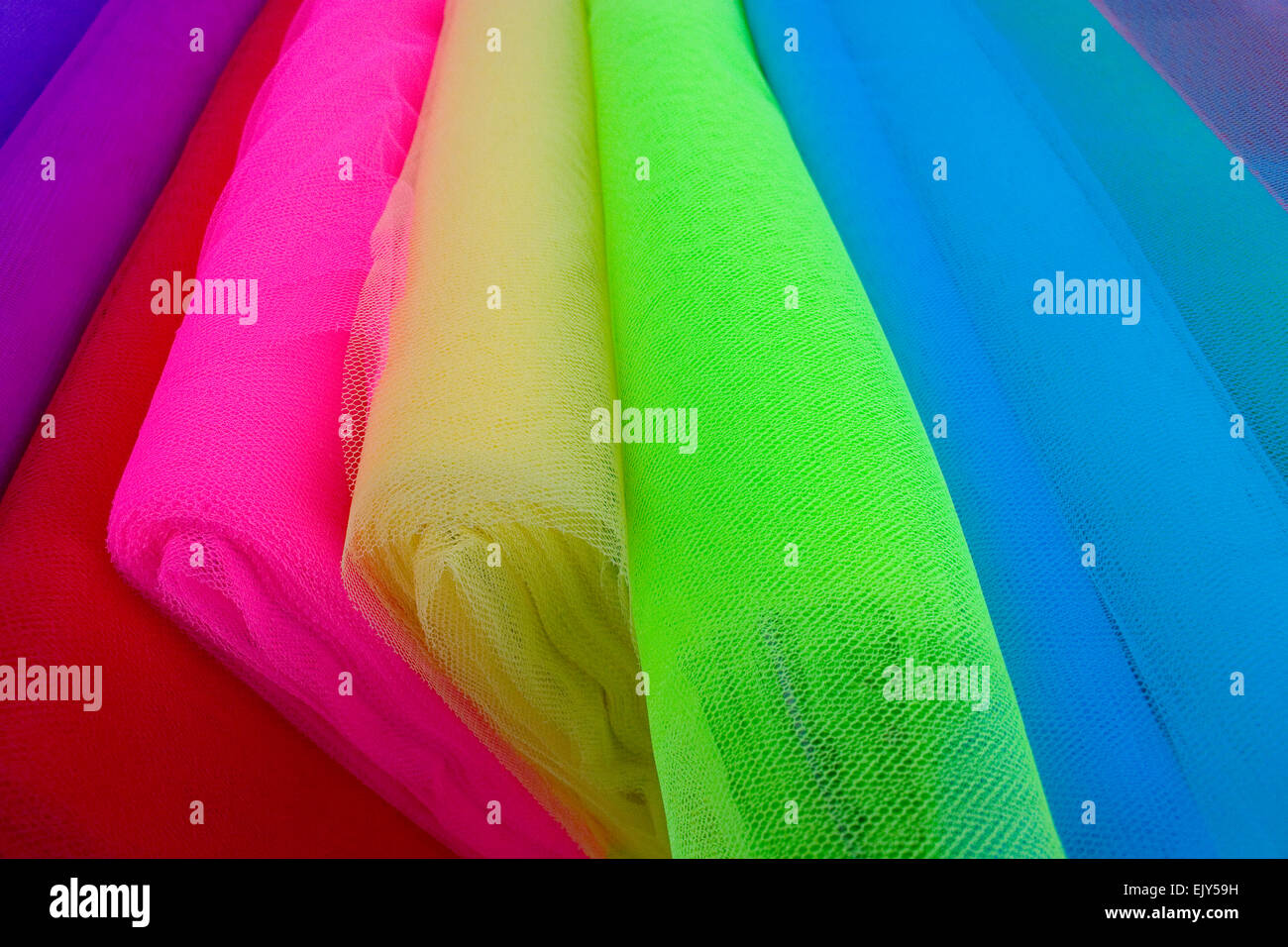 Colored coloured cloth fabric vibrant bright Stock Photo - Alamy