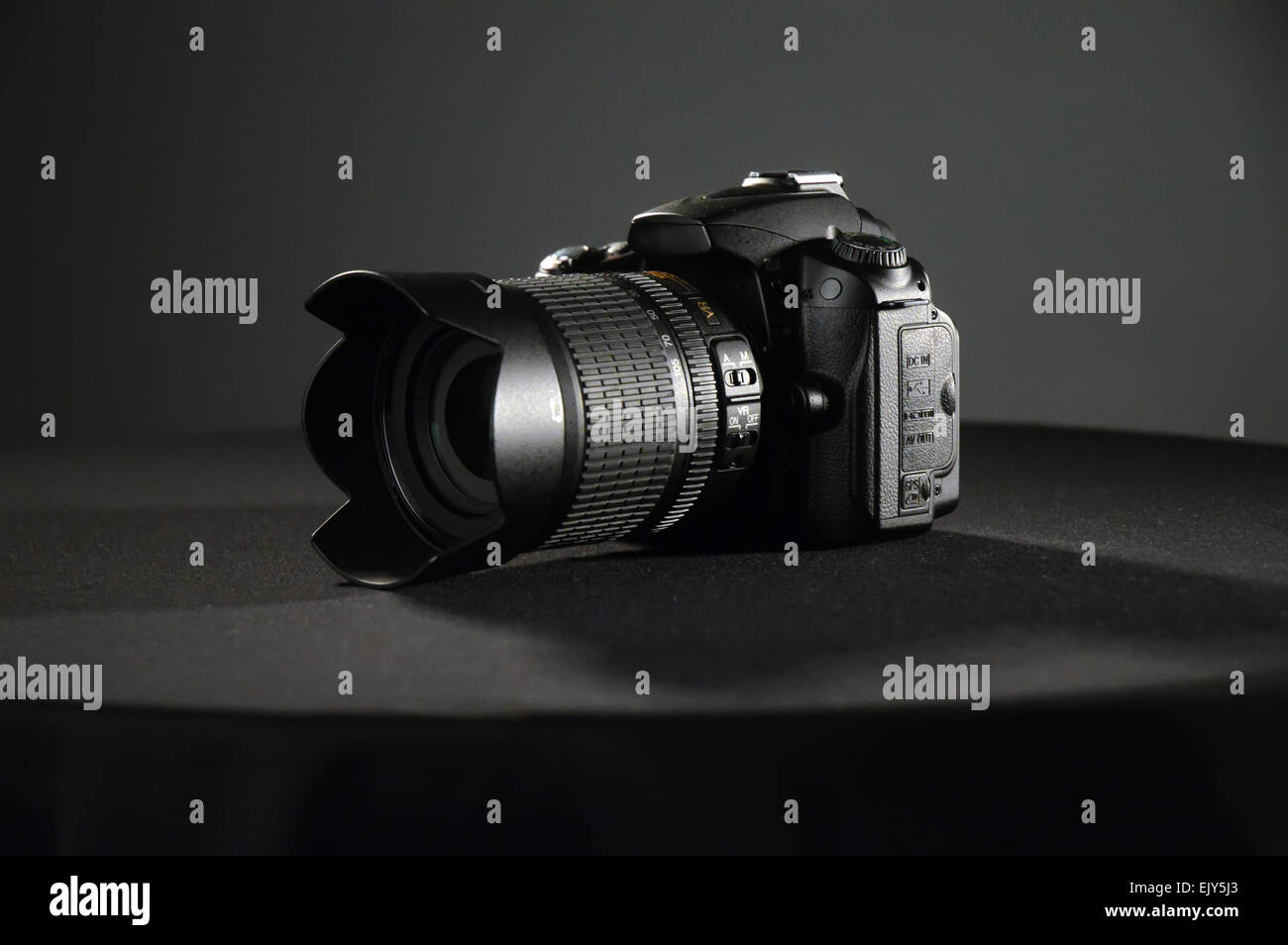 Digital camera on the black background Stock Photo - Alamy