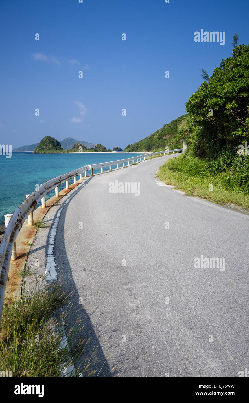 Road running next to the ocean on Zamami Island, Okinawa, Japan Stock ...