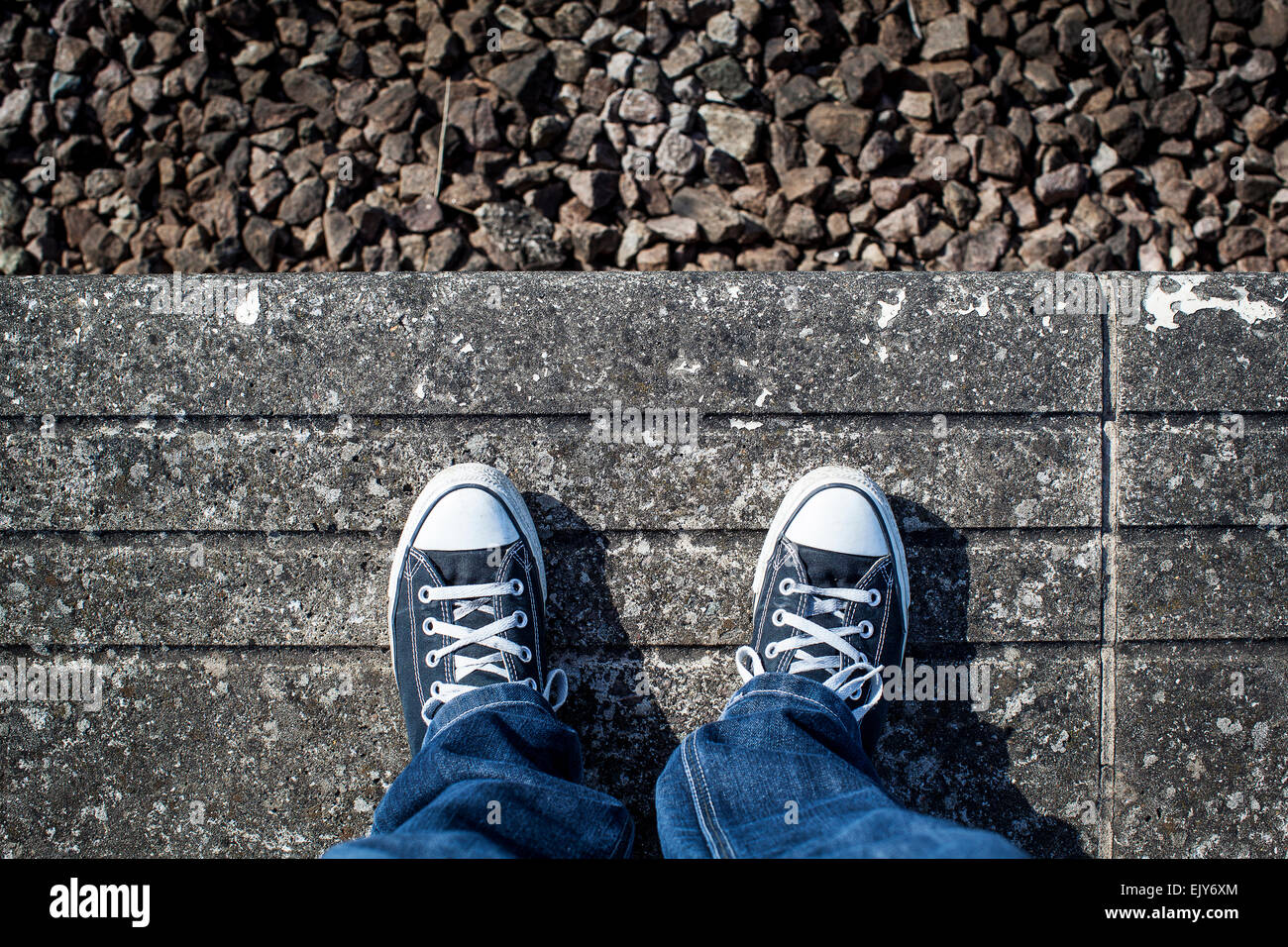 Feet standing on a train platform Stock Photo - Alamy