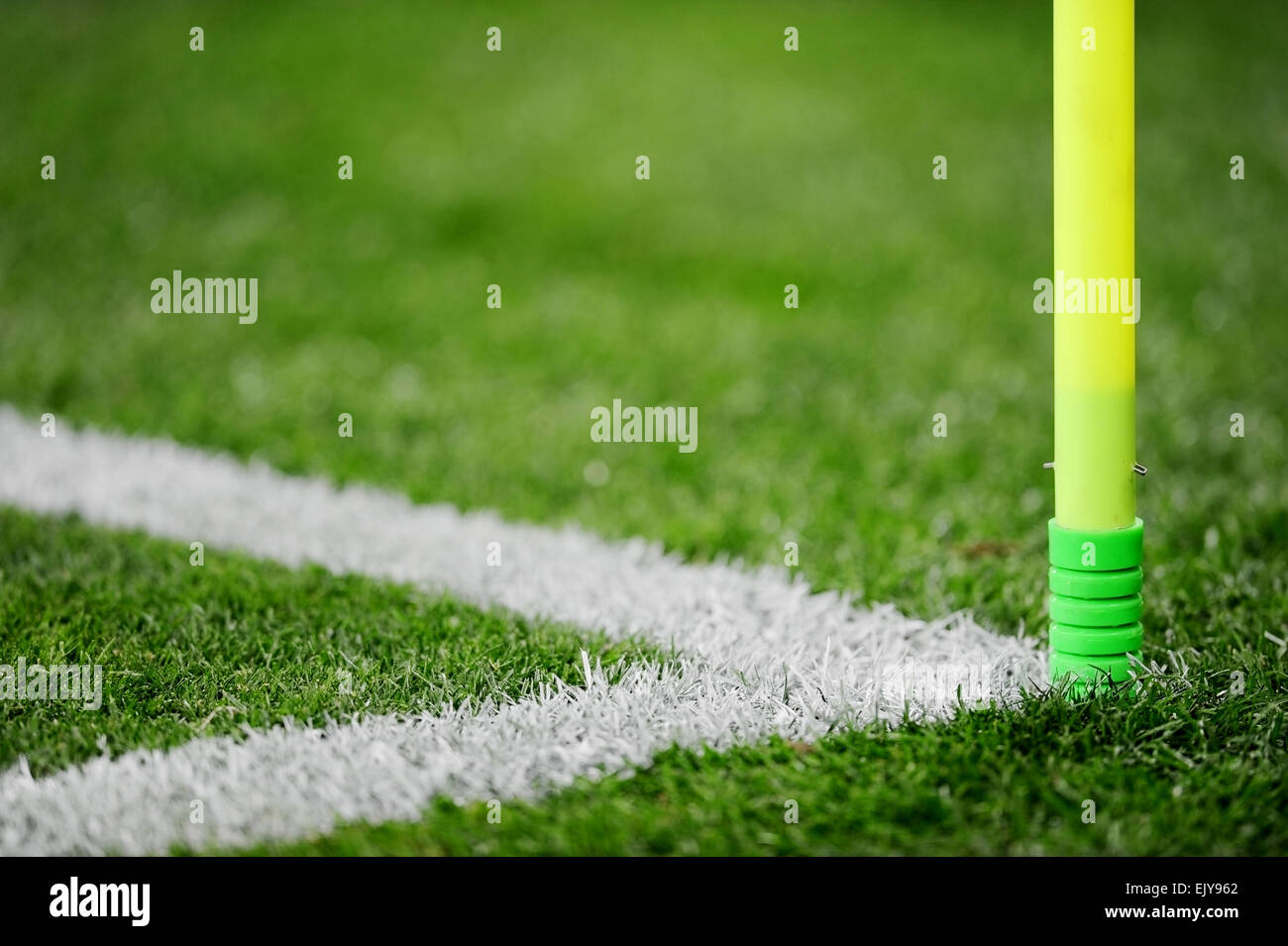 Football field corner detail with white marks and flag stick Stock ...