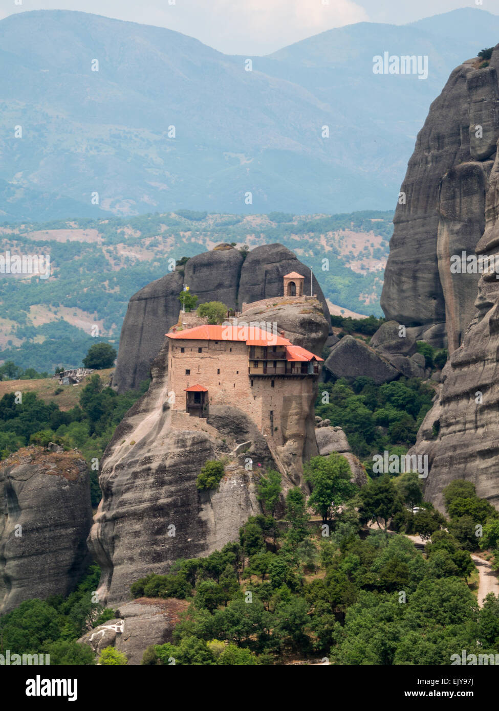 Moni Agiou Nikolaou monastery atop a rock in Meteora landscape Stock ...
