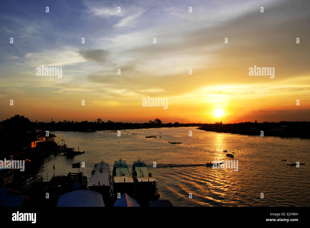 Beautiful sunset over the river Stock Photo - Alamy