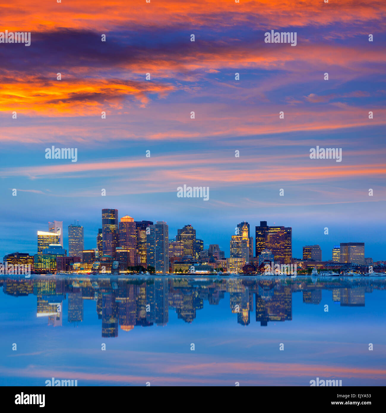 Boston skyline at sunset and river reflection in Massachusetts USA ...