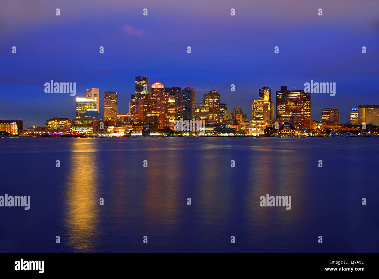 Boston skyline at sunset and river reflection in Massachusetts USA ...