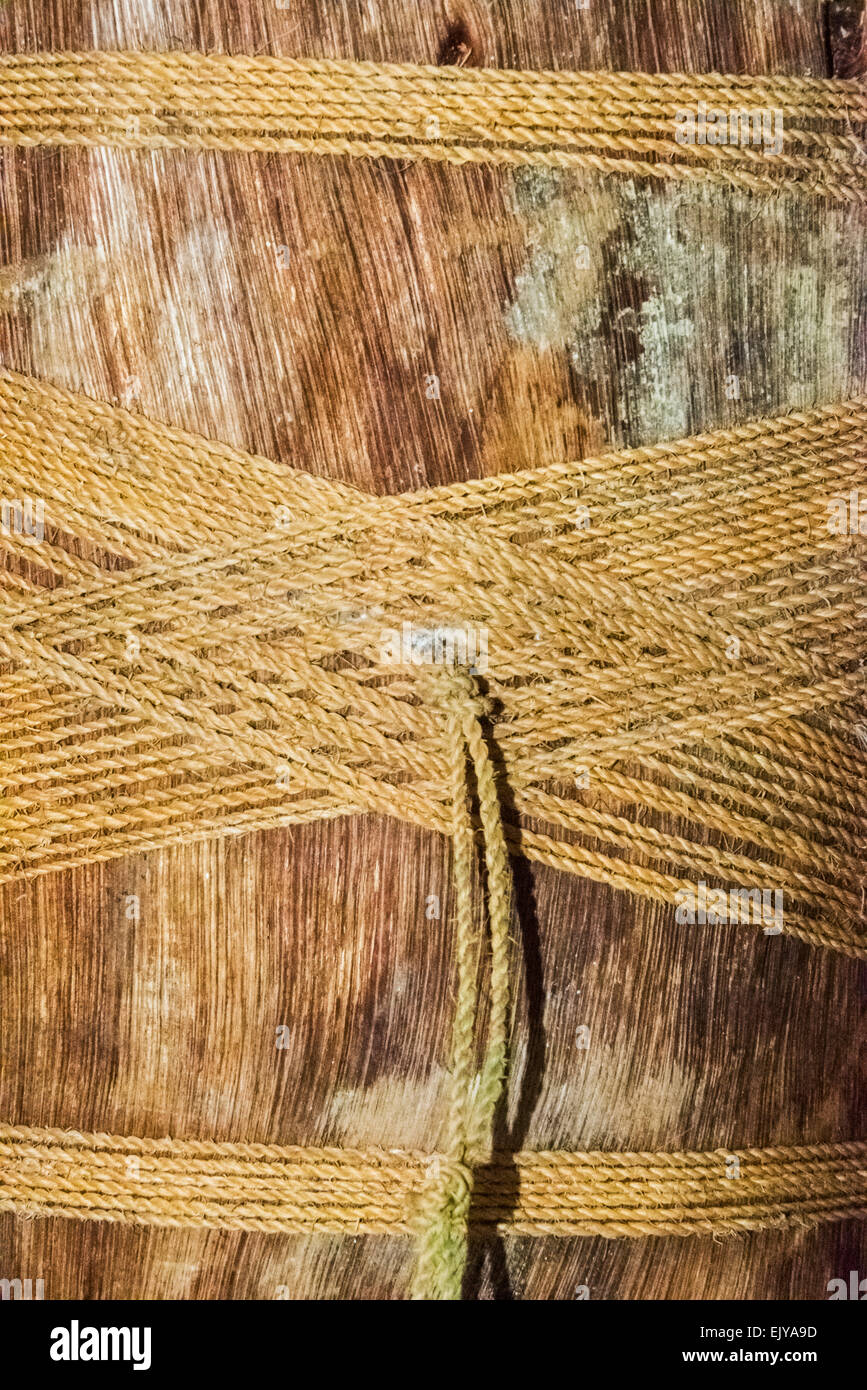Using ropes to tighten joints in traditional house, Yap Island ...
