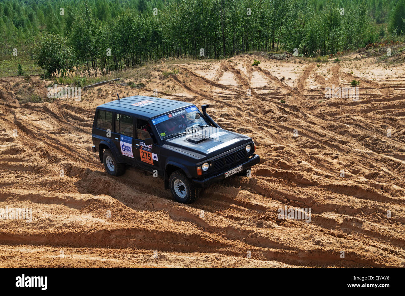 Races on a rally-raid on sandy dunes. Rally-raid Baha "Belarus" 2014 ...