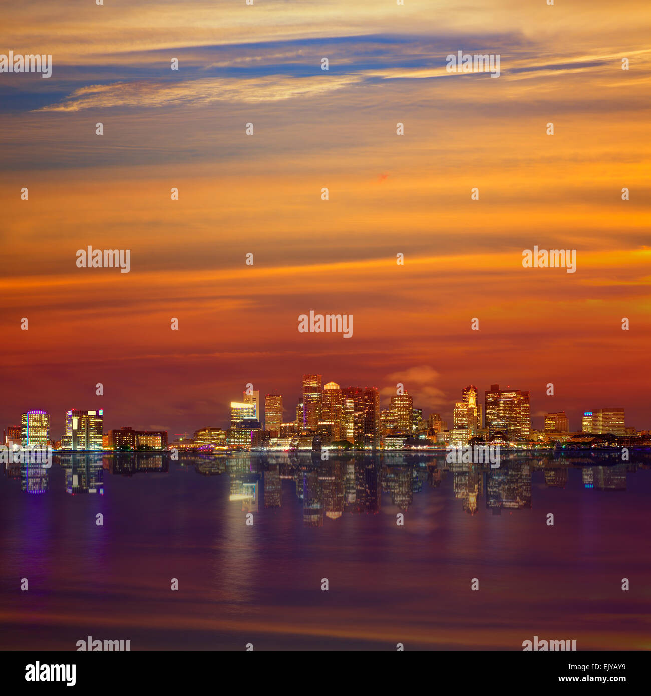 Boston skyline at sunset and river reflection in Massachusetts USA ...