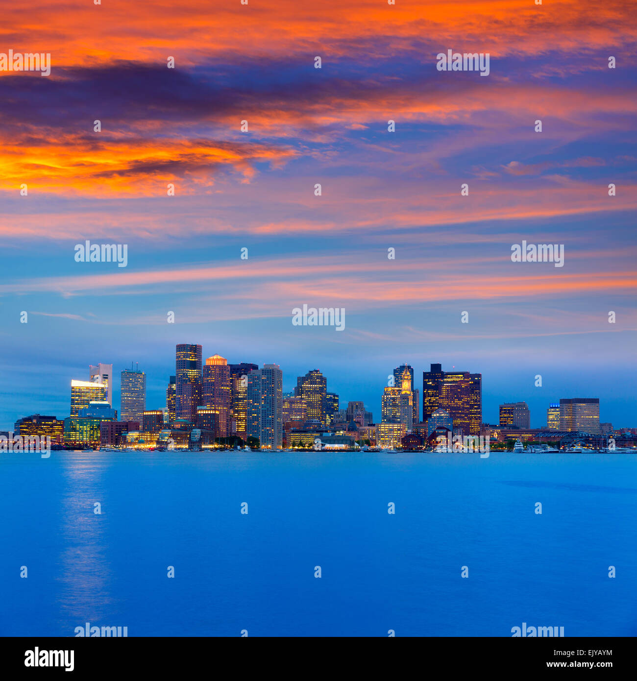 Boston skyline at sunset and river reflection in Massachusetts USA ...