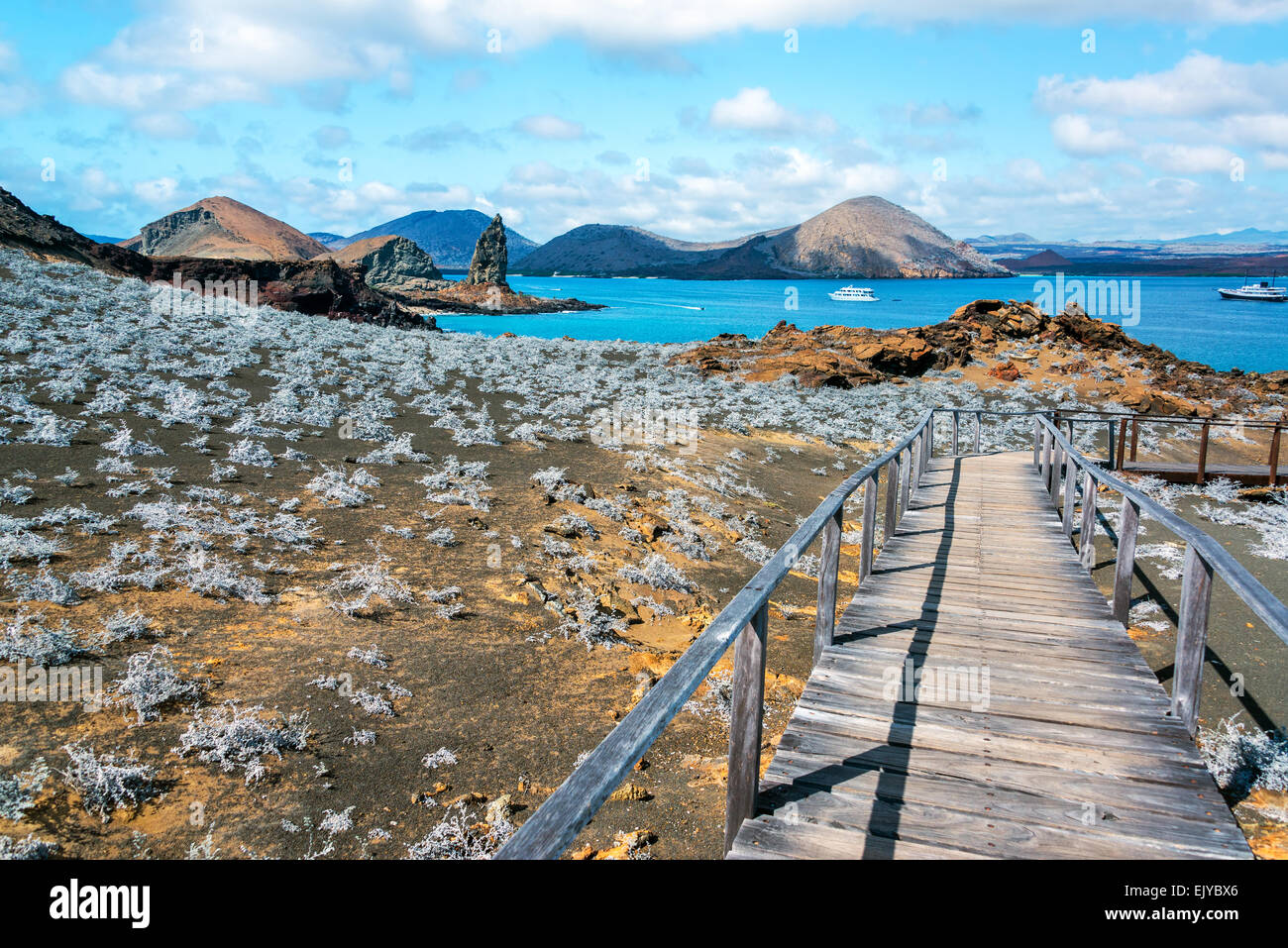 View of walkway on Bartolome Island with Pinnacle Rock in the ...