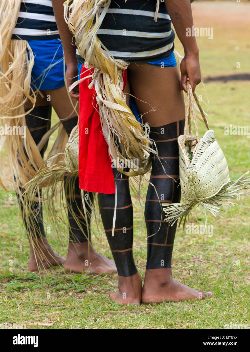 Yapese men in traditional clothing carrying hand bag at Yap Day ...