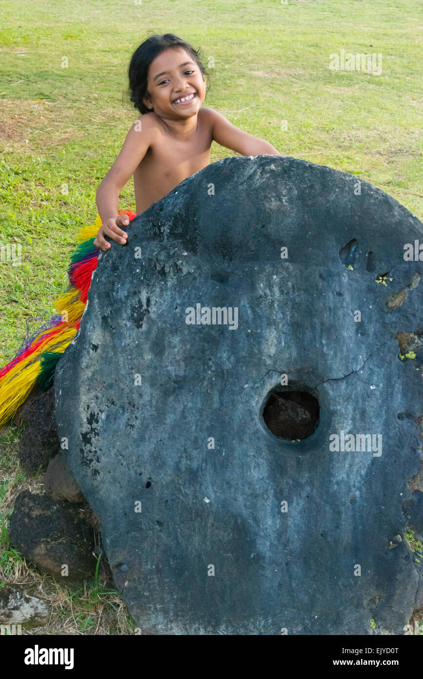 Yapese girl in traditional clothing with stone money at Yap Day ...
