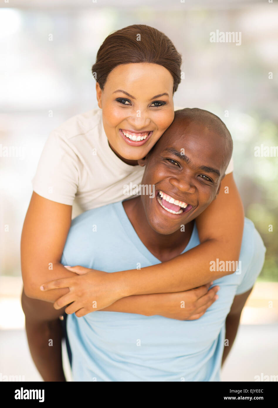 cheerful young African American couple having fun with piggyback Stock ...