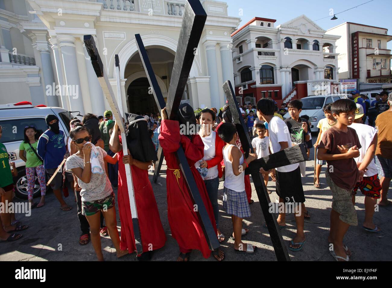 Manila, Philippines. 02nd Apr, 2015. Penitents carry crosses in San ...