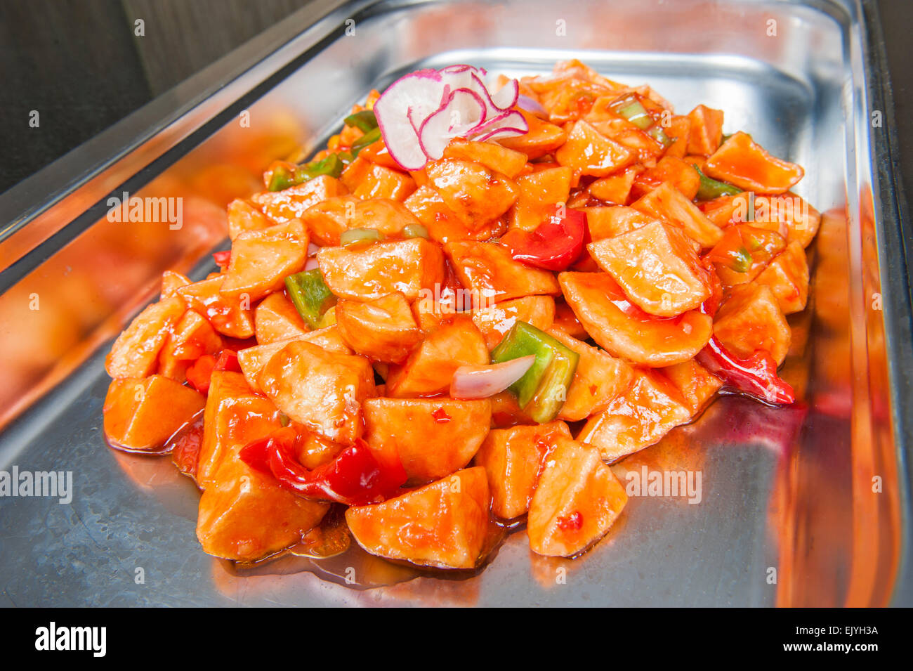 Closeup of chinese sweet chilli potatoes meal on display at a hotel ...