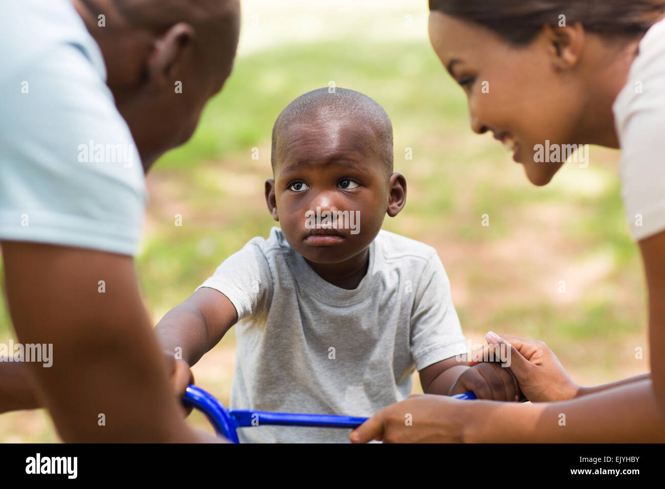 cute young African family playing outdoors Stock Photo - Alamy