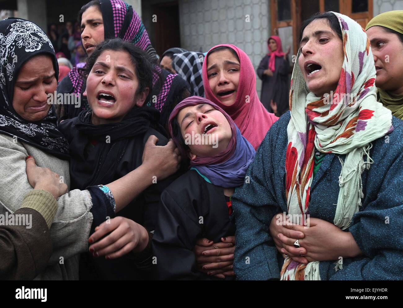 Srinagar, Indian-controlled Kashmir. 2nd Apr, 2015. Family members of ...