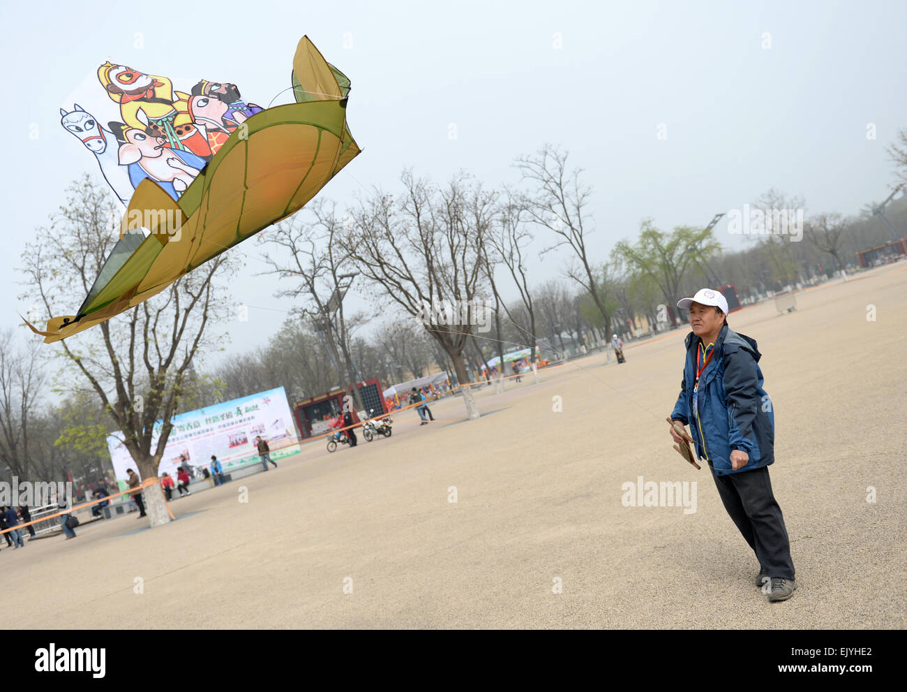 Xi'an, China's Shaanxi Province. 3rd Apr, 2015. A kite fan flies a kite ...