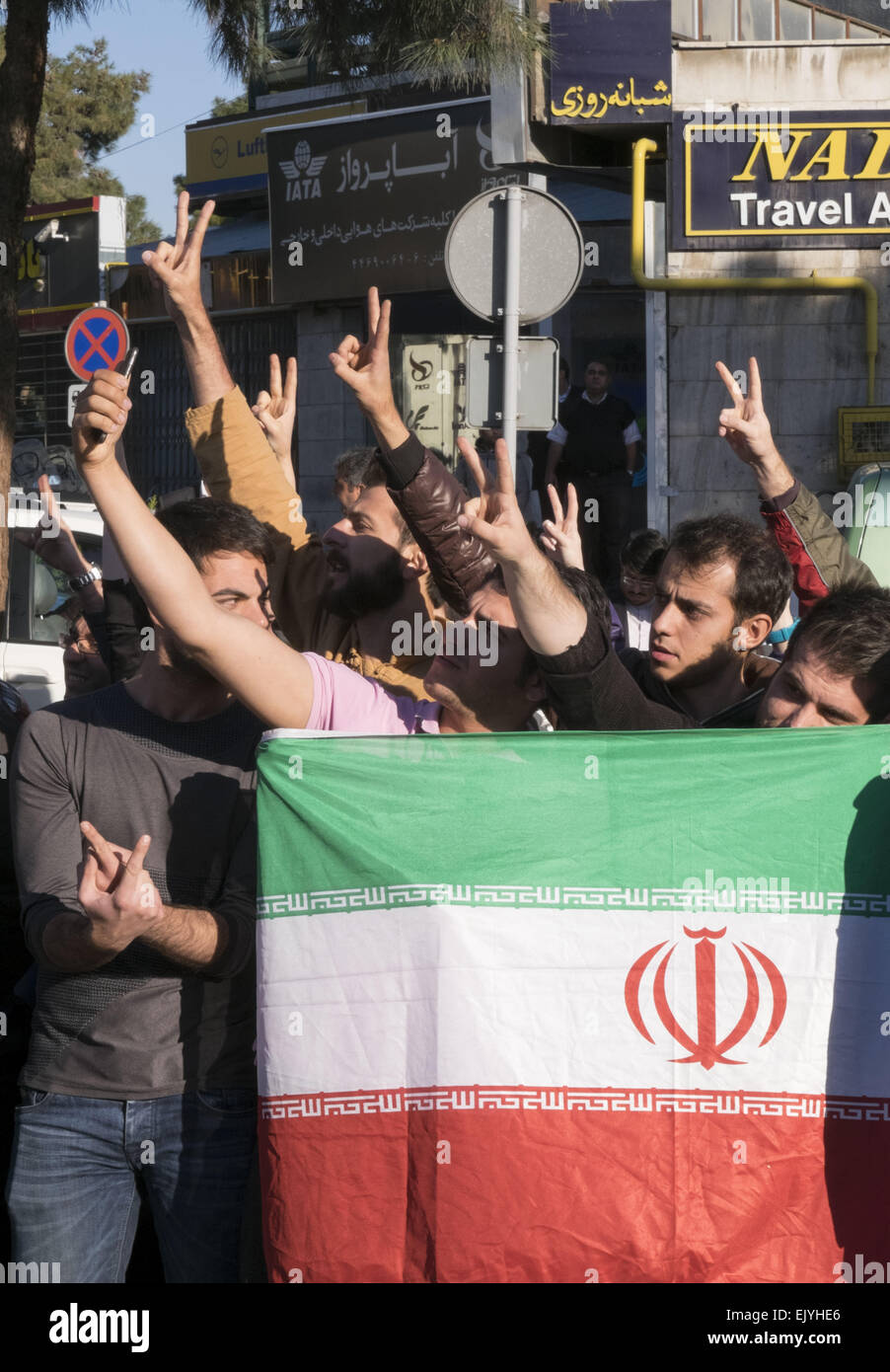 Tehran, Iran. 3rd Apr, 2015. A group of Iranians flash Victory sign as ...