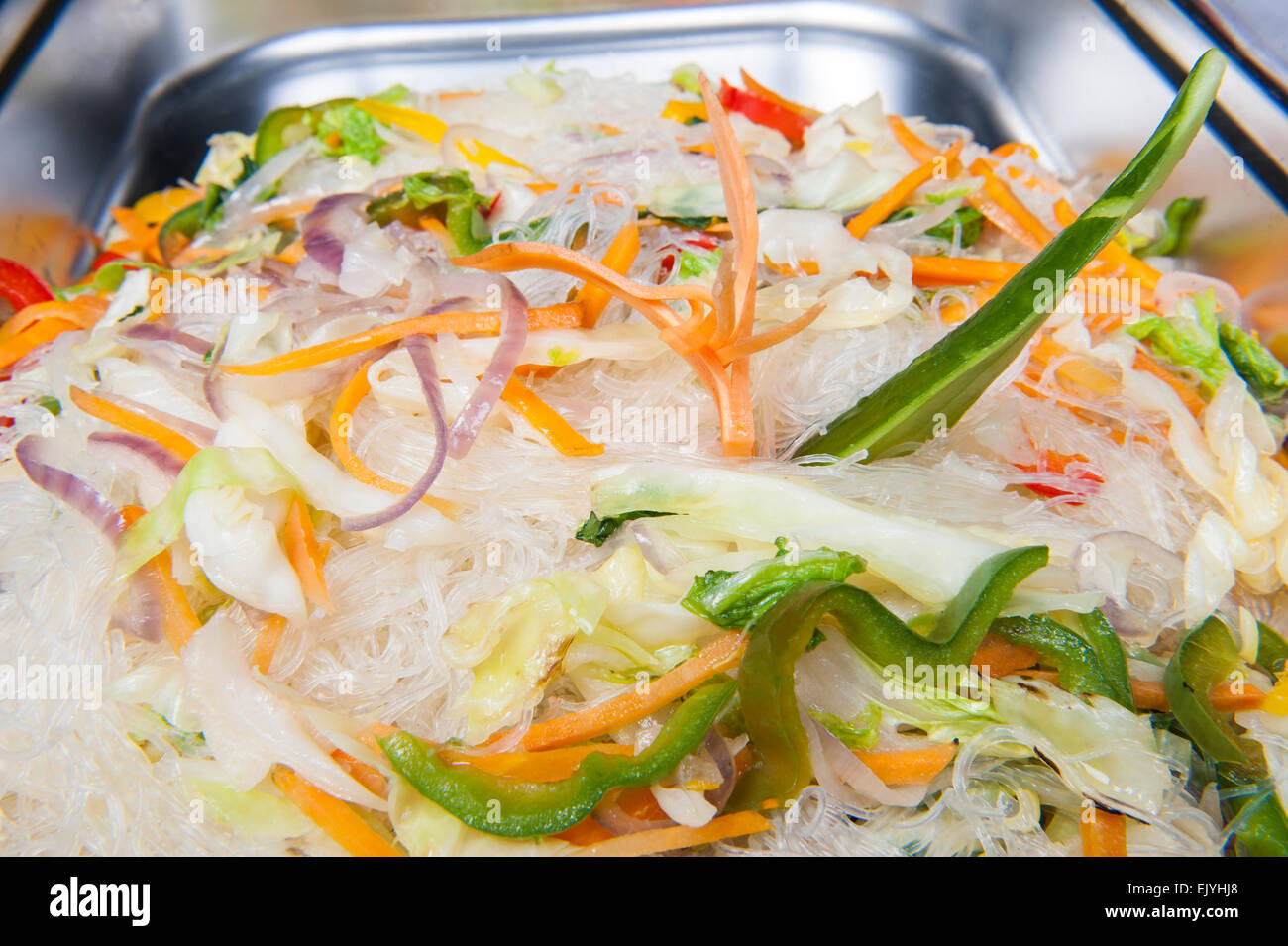 Closeup of chinese vegetable glass noodles on display at a hotel buffet ...