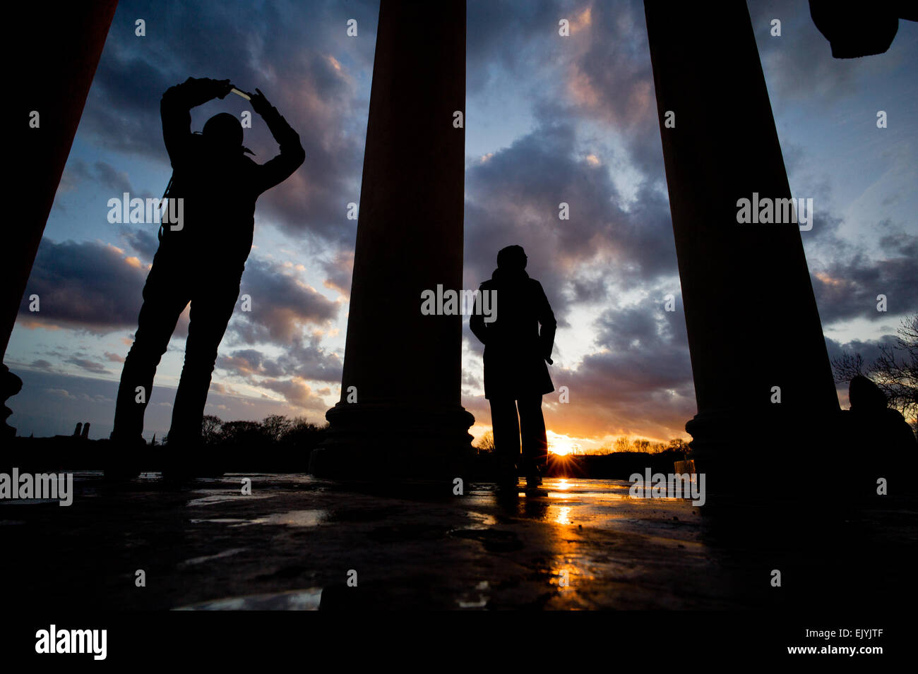 Munich, Germany. 02nd Apr, 2015. People watch the sunset at the ...