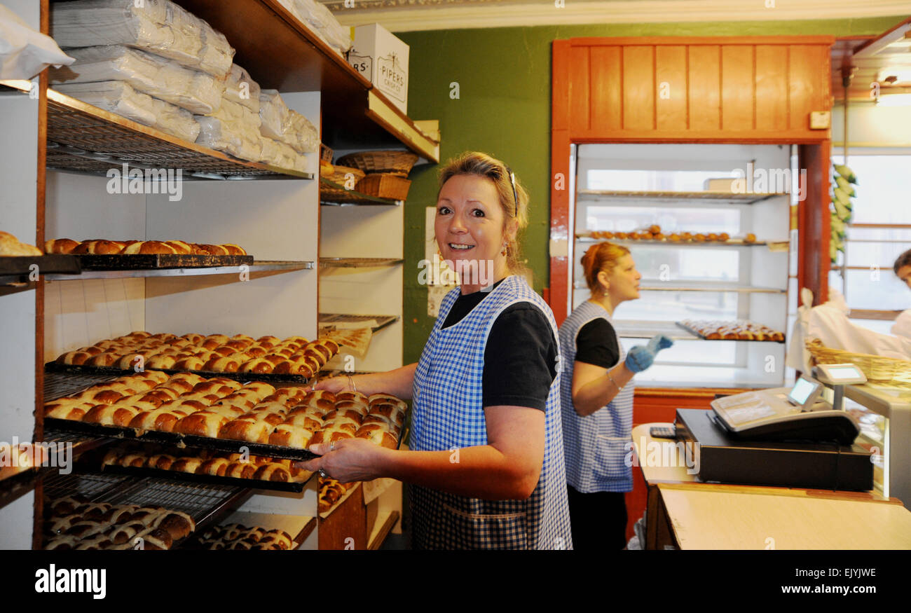 Brighton UK 3 April 2015 - Lynn Starkey with trays of hot cross buns ...