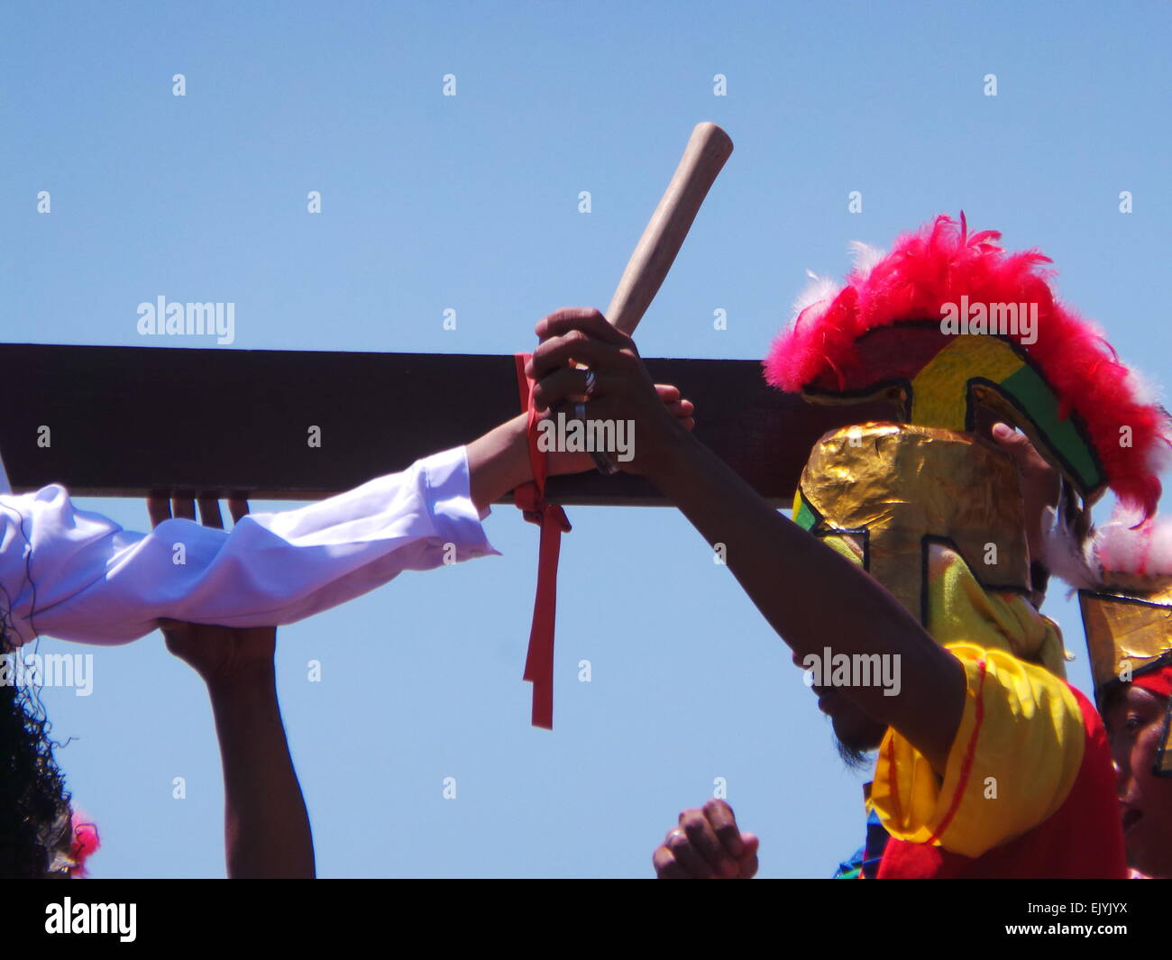 Woman nailed to the cross hi-res stock photography and images - Alamy