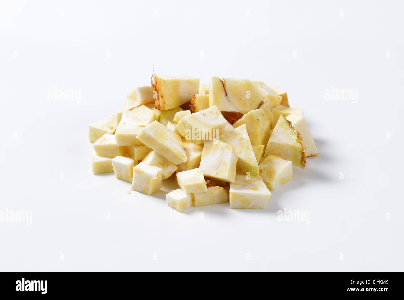 Heap of diced celery root Stock Photo - Alamy