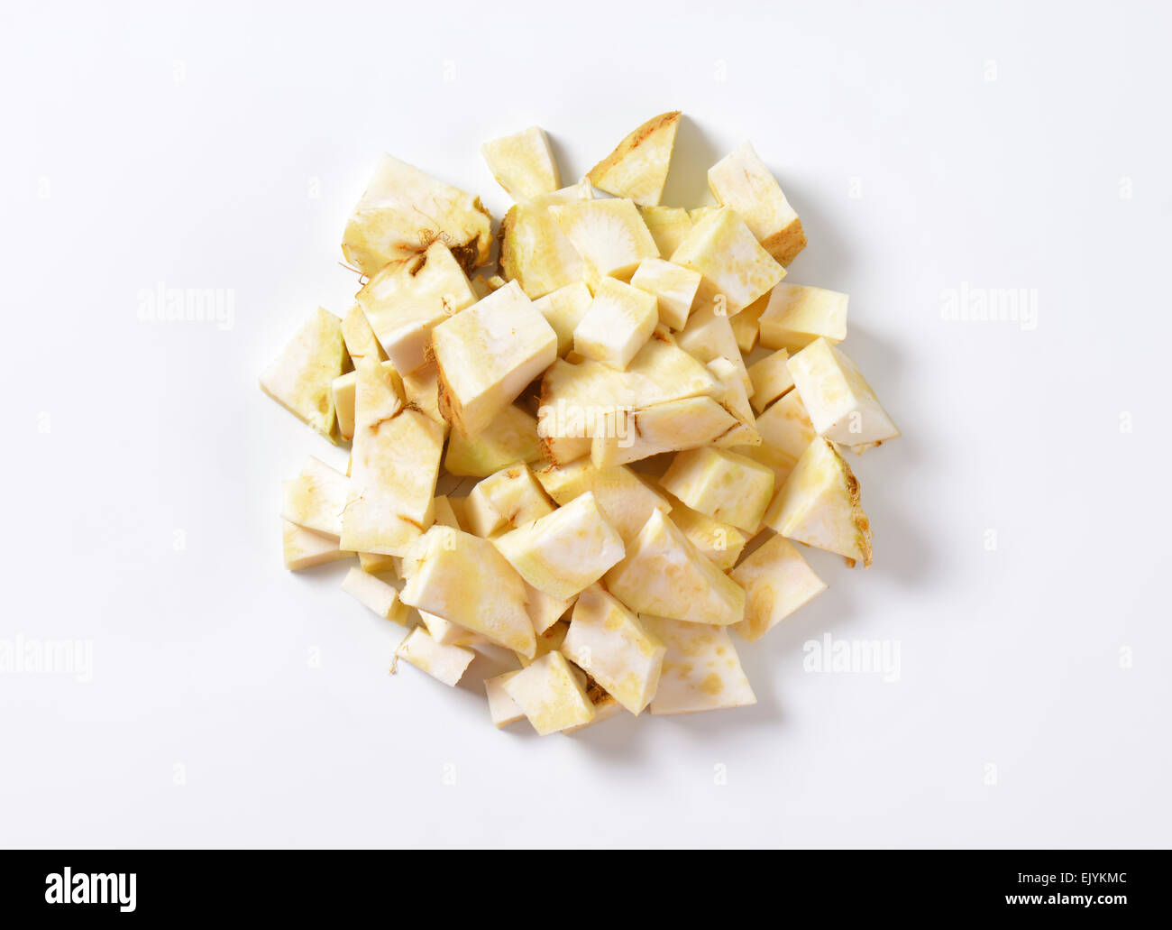 Heap of diced celery root Stock Photo - Alamy