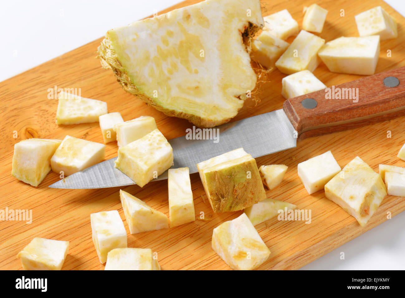 Diced celery root on cutting board Stock Photo - Alamy