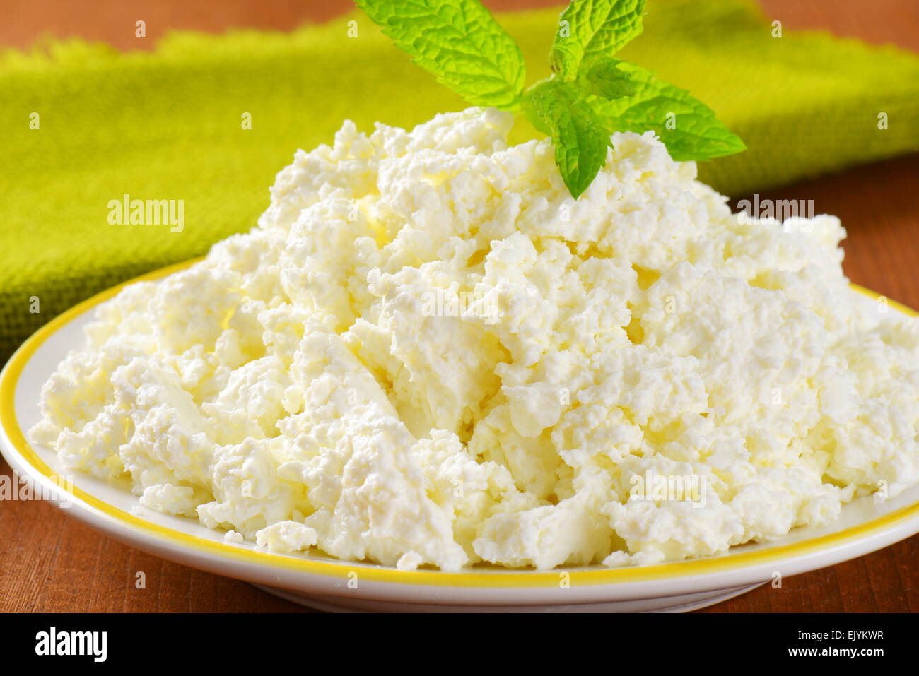 Plate of white crumbly cheese Stock Photo - Alamy