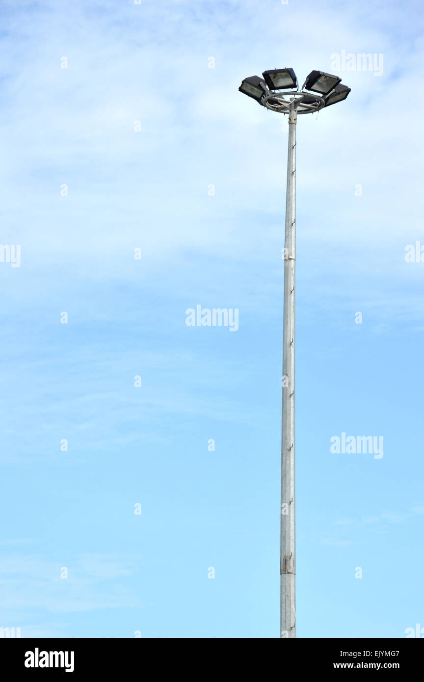 park light poles with white clouds and blue sky backgrounds Stock Photo ...
