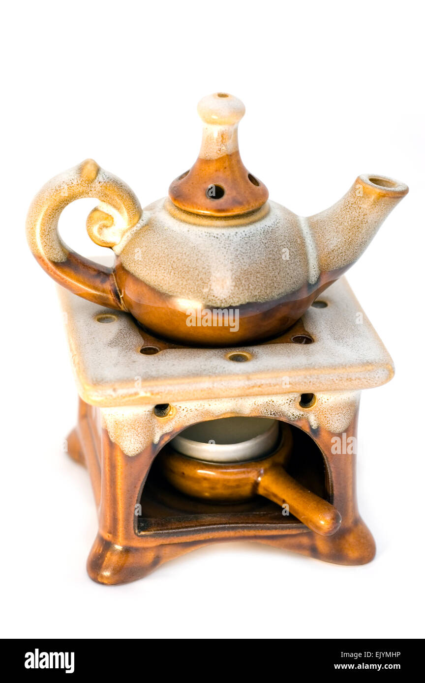 Teapot candle Cut Out Stock Images & Pictures - Alamy