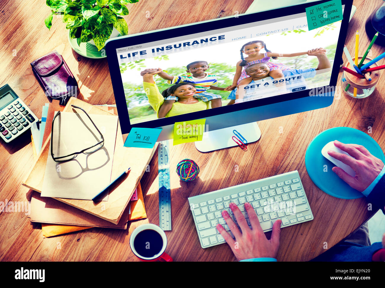 Man Working with Computer Life Insurance Stock Photo - Alamy
