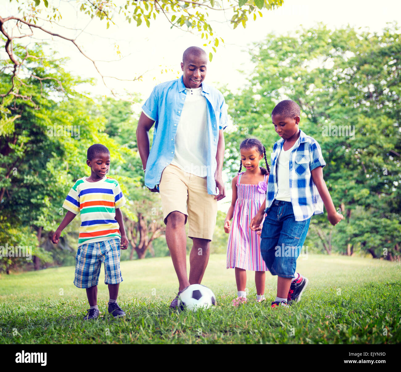 Family Bonding Recreation Sports Football Concept Stock Photo - Alamy