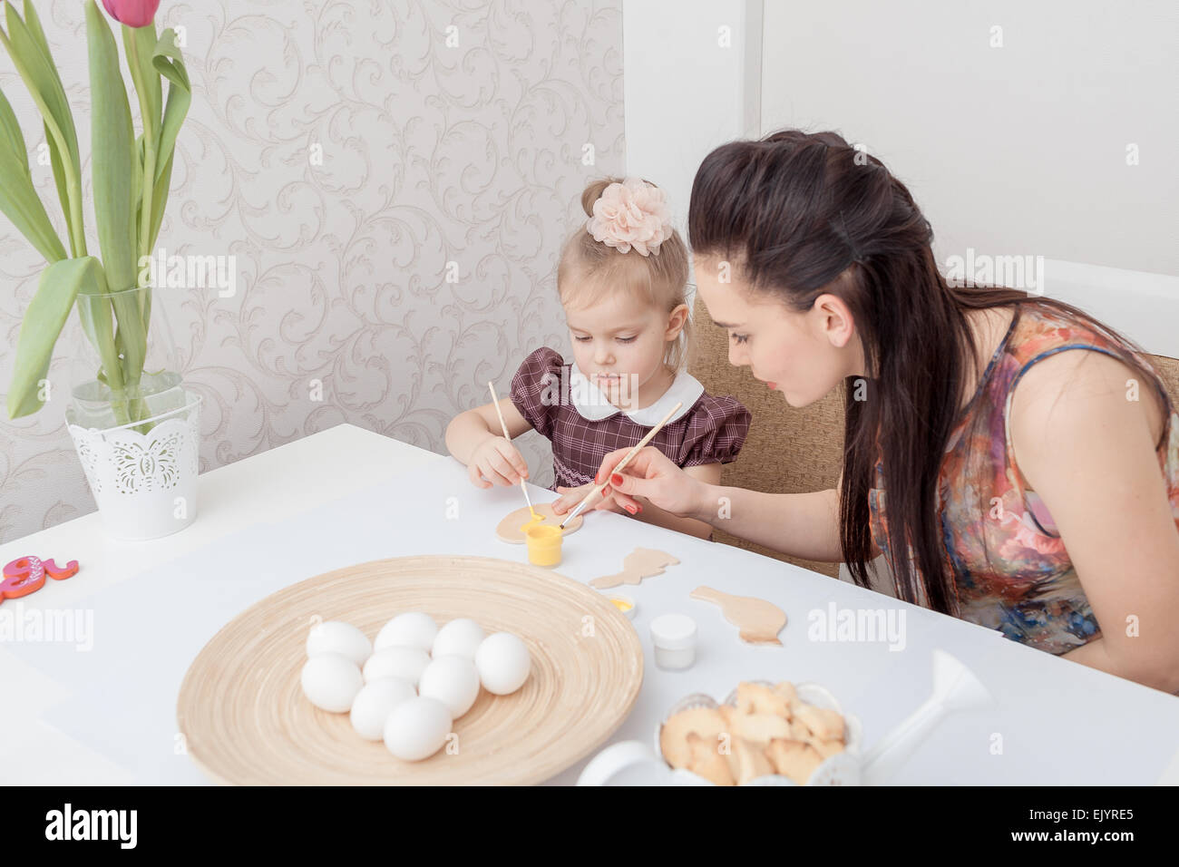 Mother and daughter with Easter eggs Stock Photo - Alamy