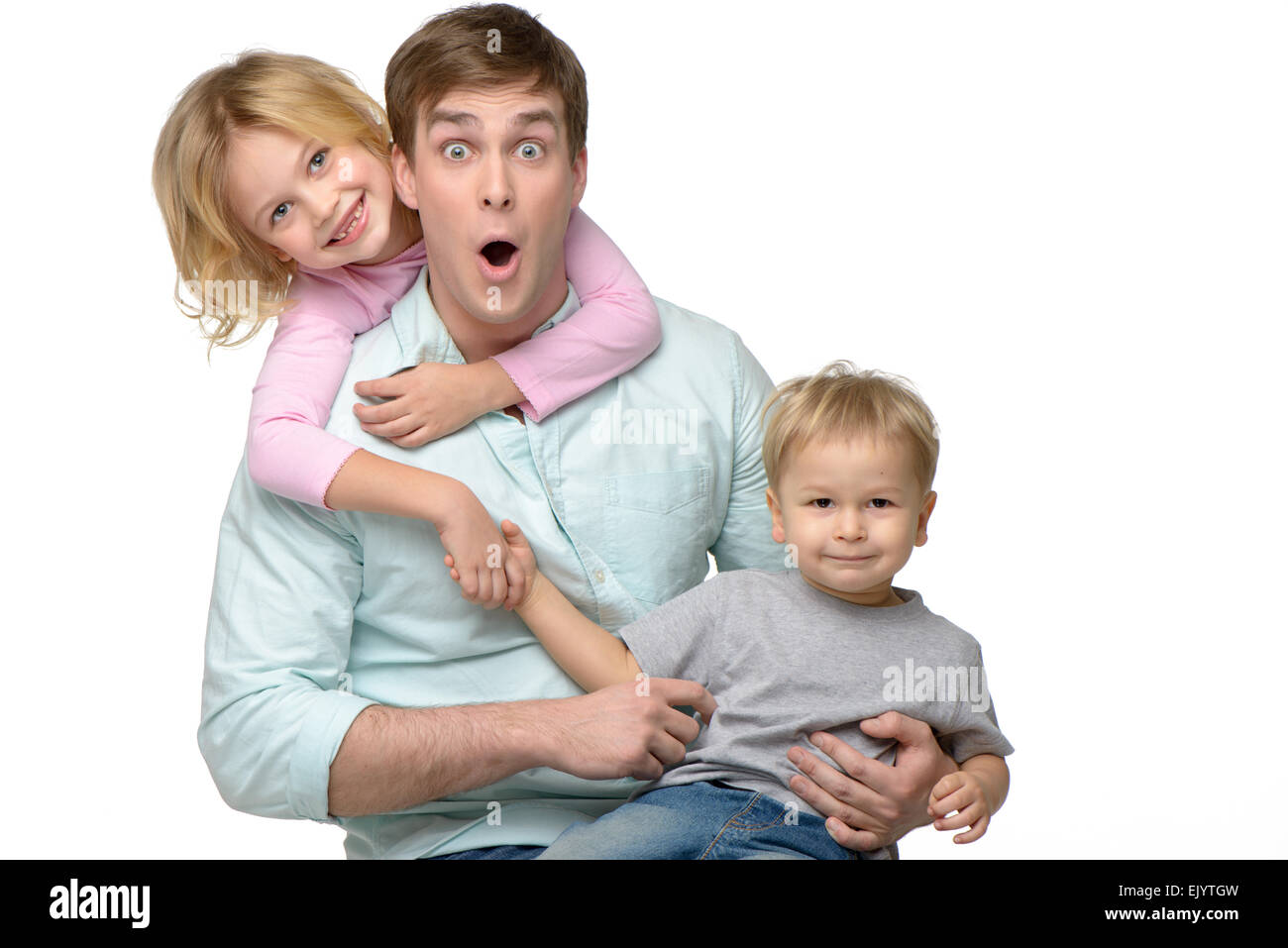 Young father with his two kids having fun Stock Photo - Alamy